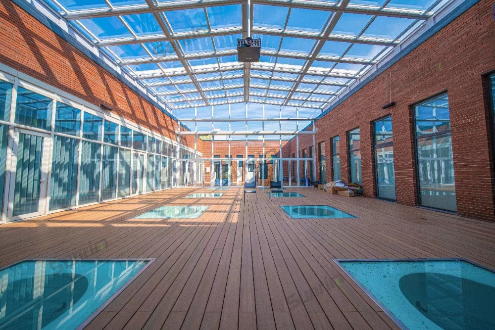Large electrically operated retractable roof for the atrium skylight at ...